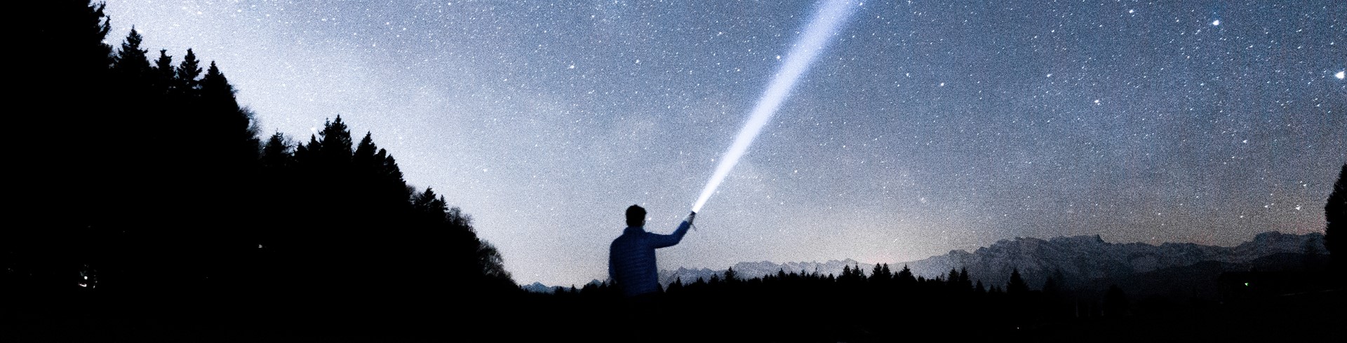 How does the light from a torch change with distance?
